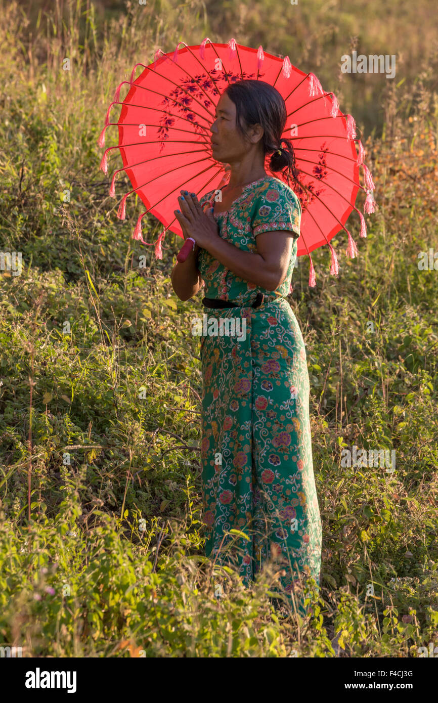 Woman with Umbrella. Myanmar Taj Mahal. Unfinished Pagoda. Mandalay ...