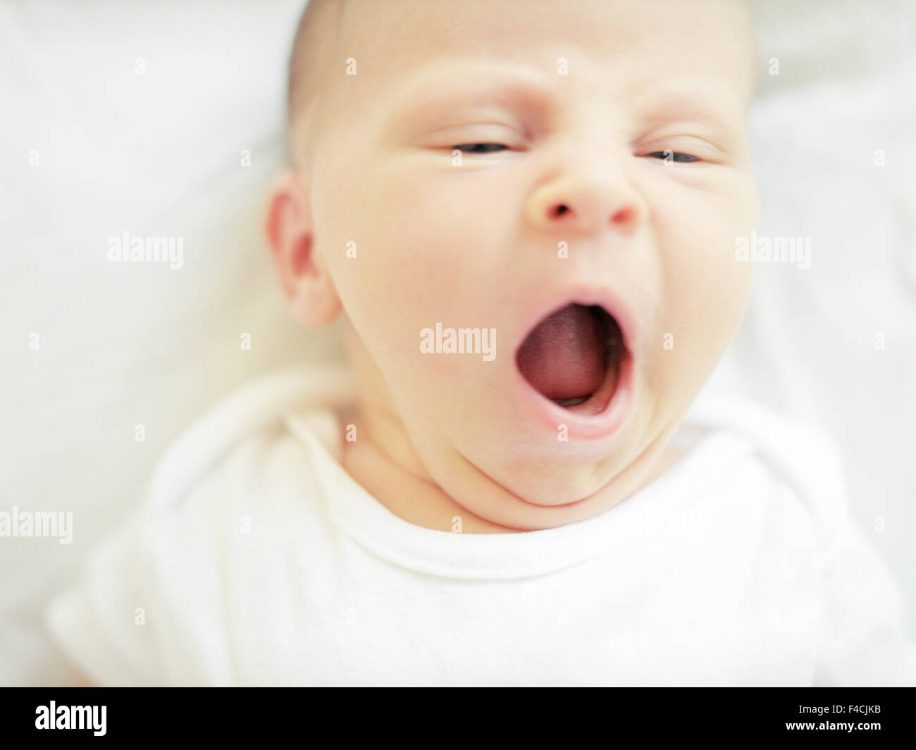 Yawning babies hi-res stock photography and images - Alamy