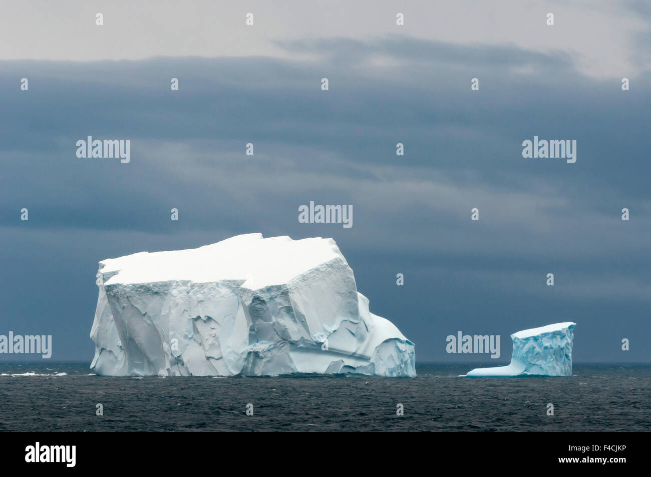 Antarctica. Bransfield Strait. Iceberg under stormy skies Stock Photo ...