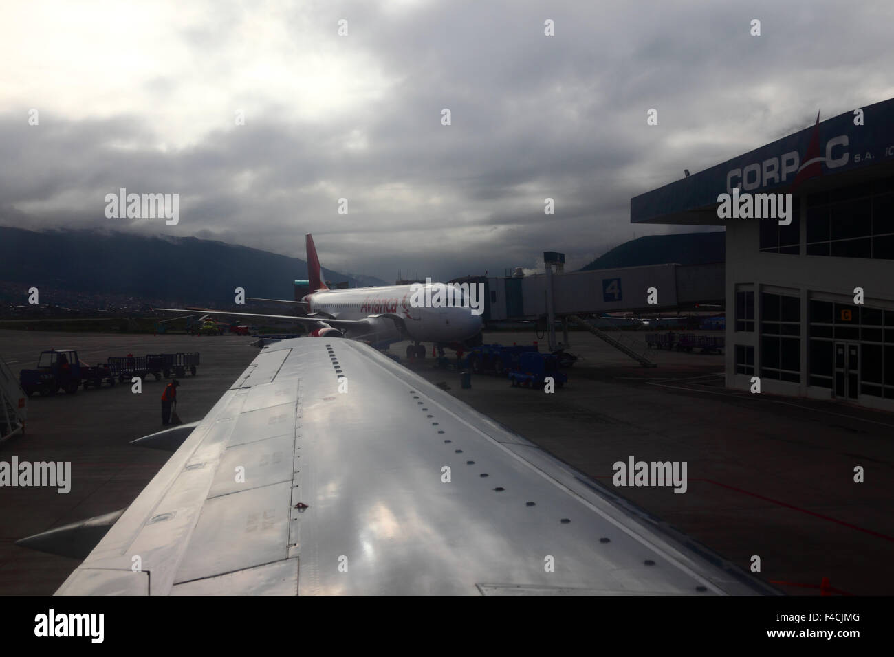 Avianca A320-200 Airbus aircraft parked on ramp outside terminal ...