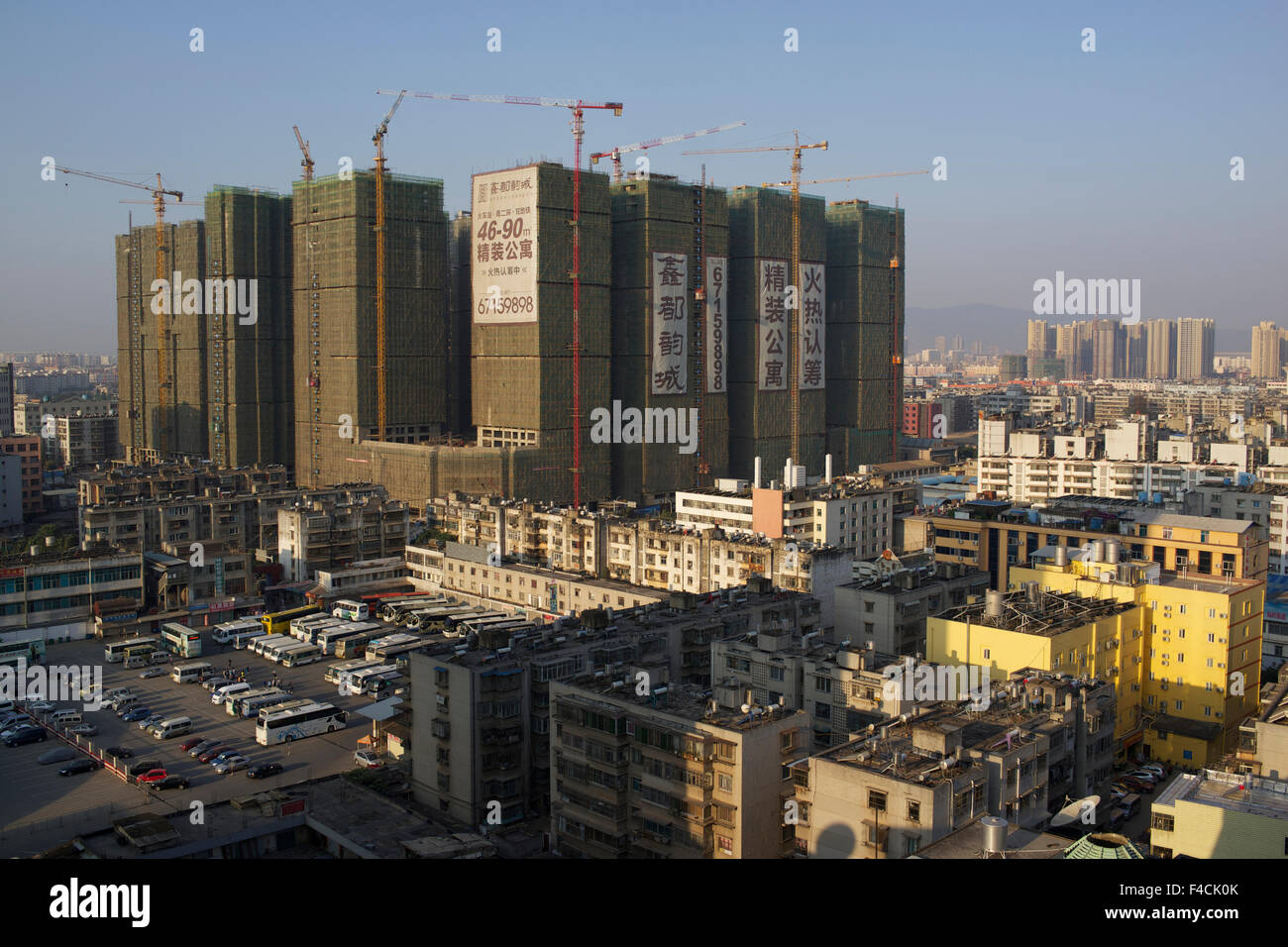 China, Yunnan Province, Mile. Building under construction in city ...