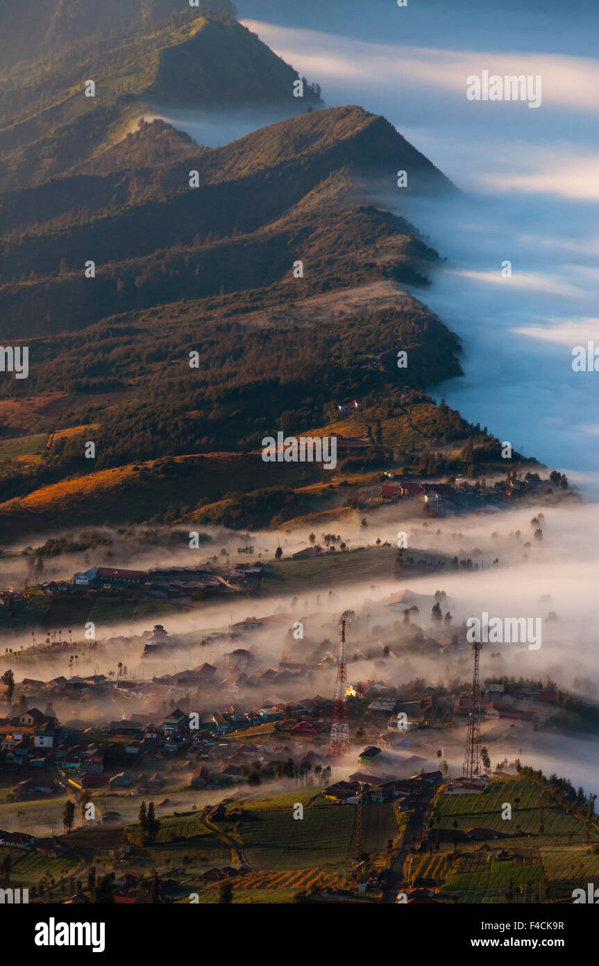 Village covered in fog Stock Photo - Alamy