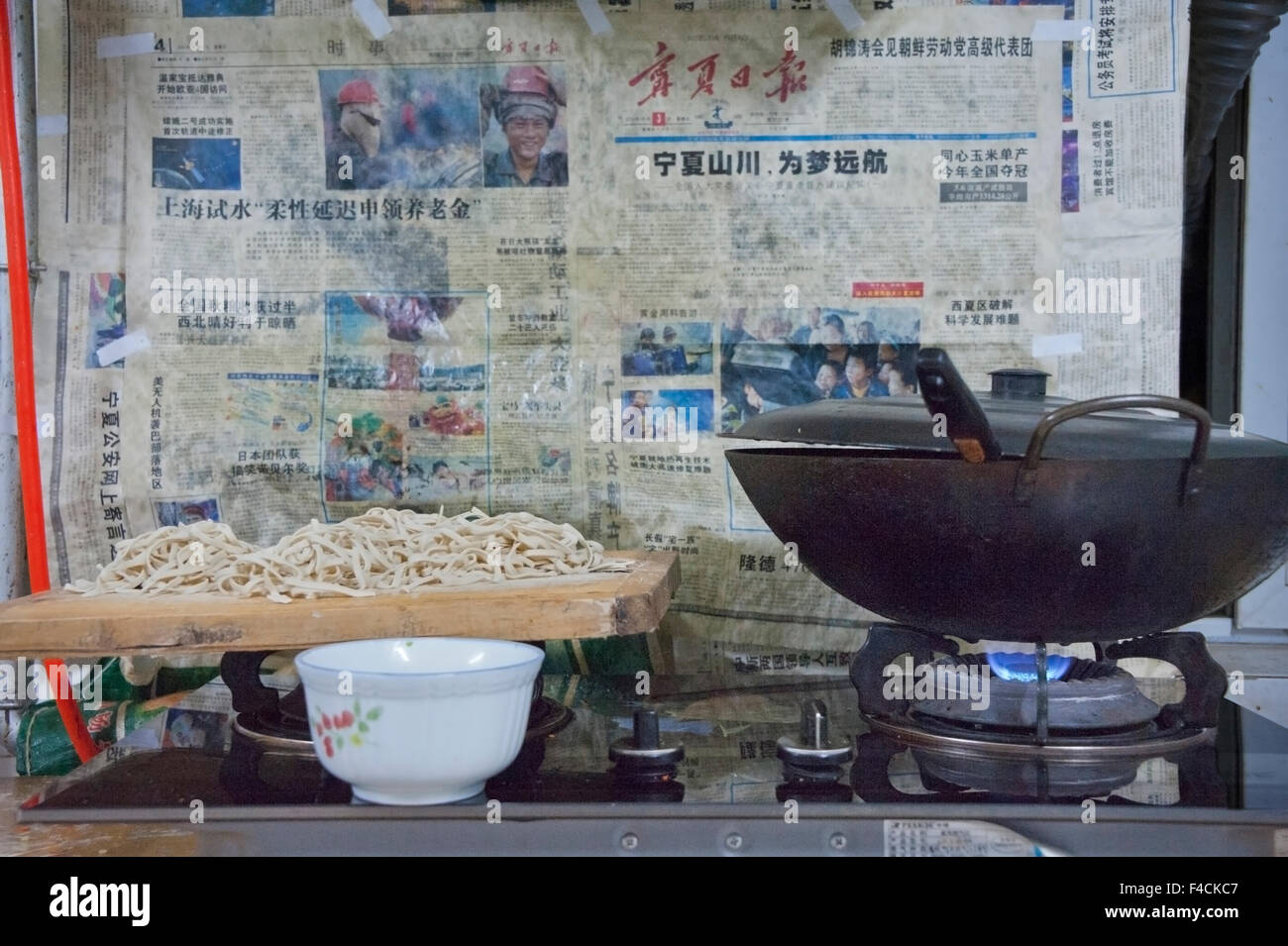 China, Ningxia, Yinchuan. Simple cooking tools are used in the kitchen ...
