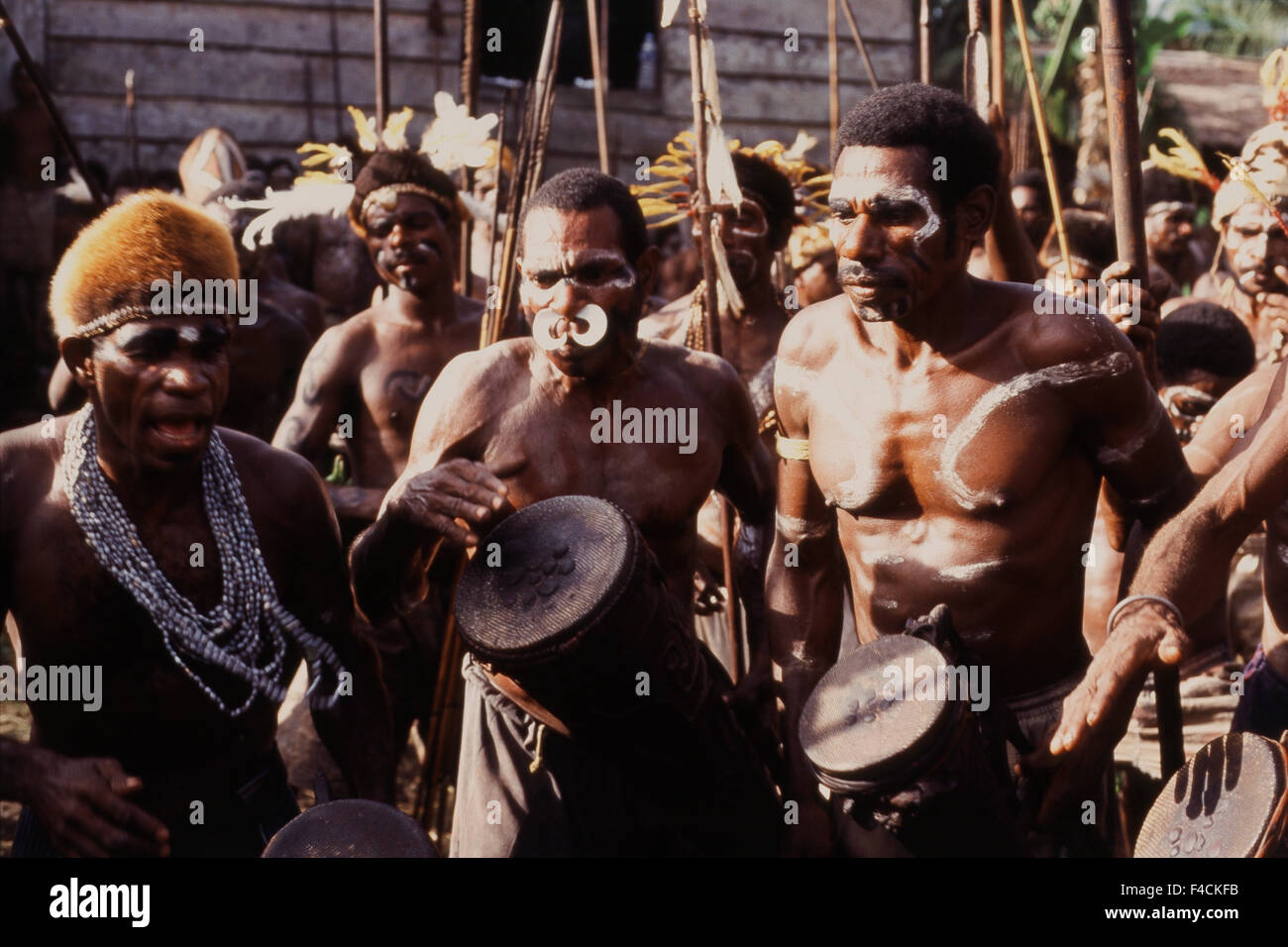Indonesia, Irian Jaya, Asmat people playing bongo and dancing. (Large ...