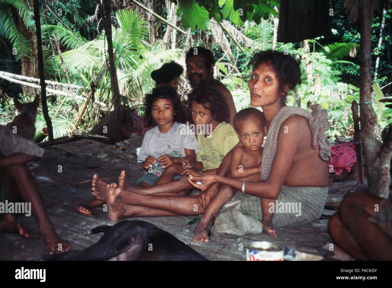 Indonesia, Maluku, Seram Island, Family sitting together. (Large format ...