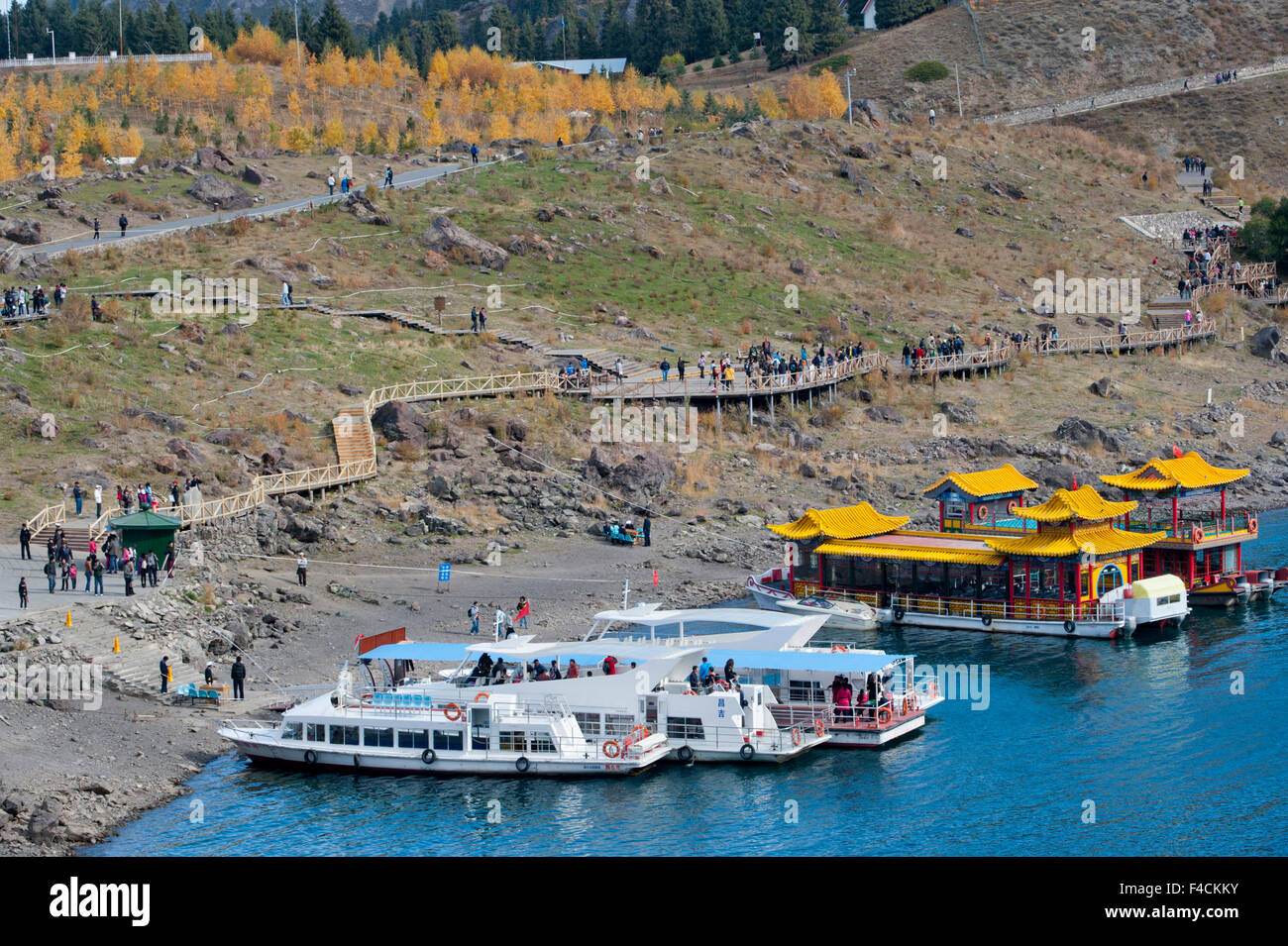 China, Xinjiang, Xinjiang Uygur Autonomous Region. People meander to ...