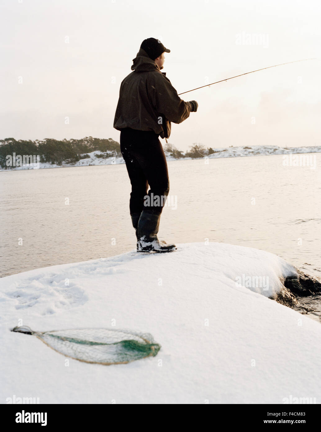 Man fishing on cliff hi-res stock photography and images - Alamy