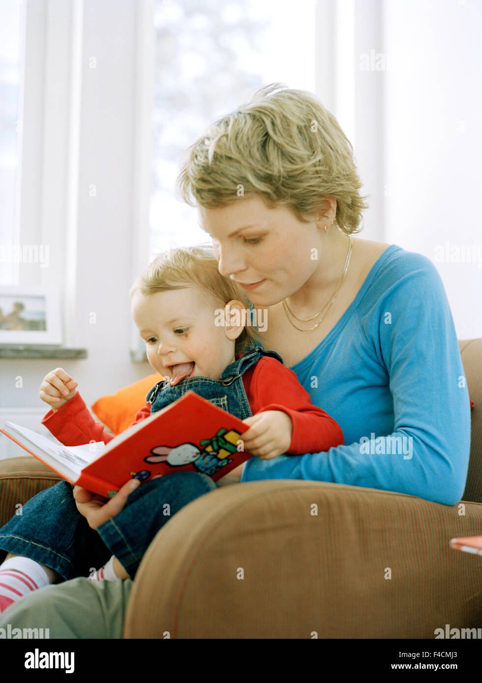 A mother reading for her child Stock Photo - Alamy