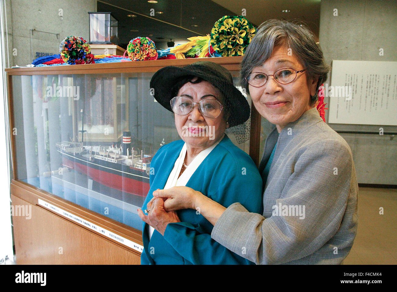 (L) Survivor Tsuneko Maria Miyagi of the WWII sea tragedy, the sinking ...
