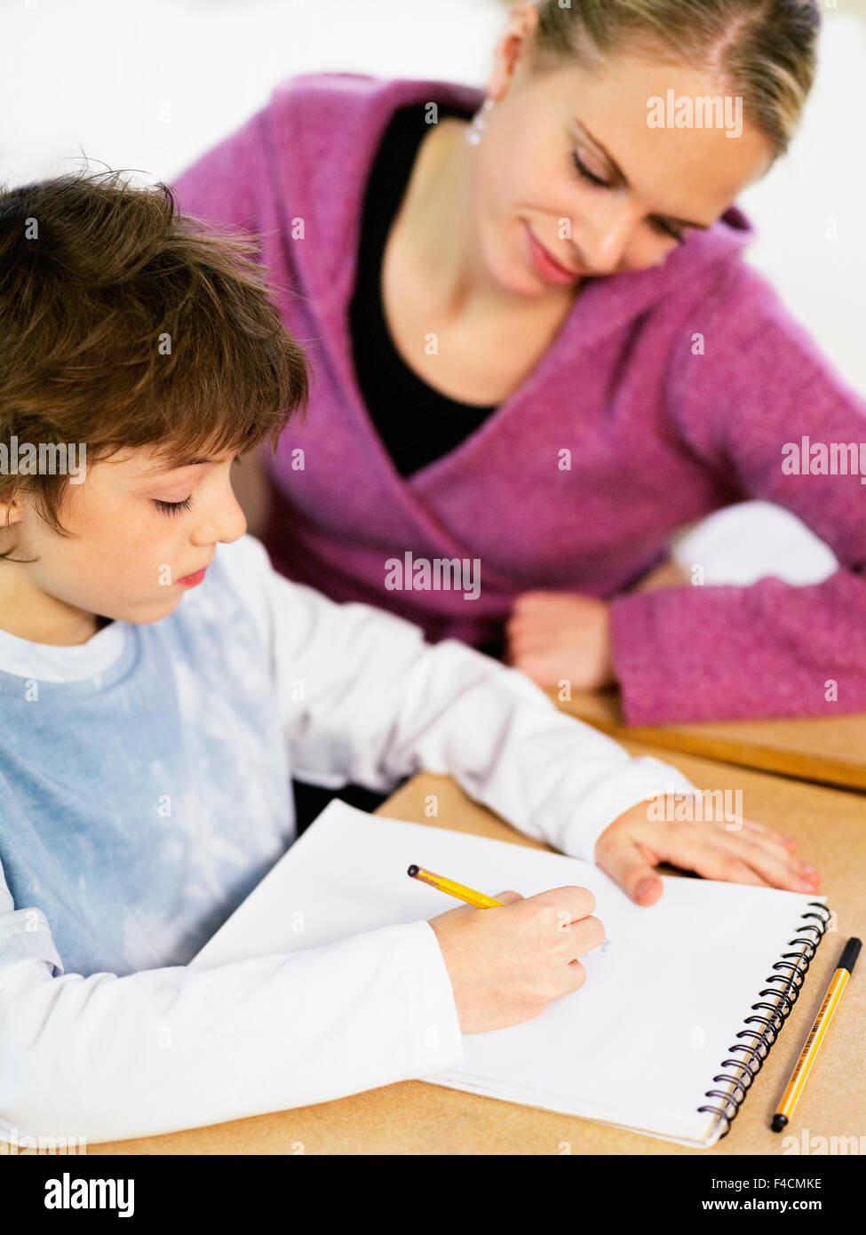 Close up children working together hi-res stock photography and images ...
