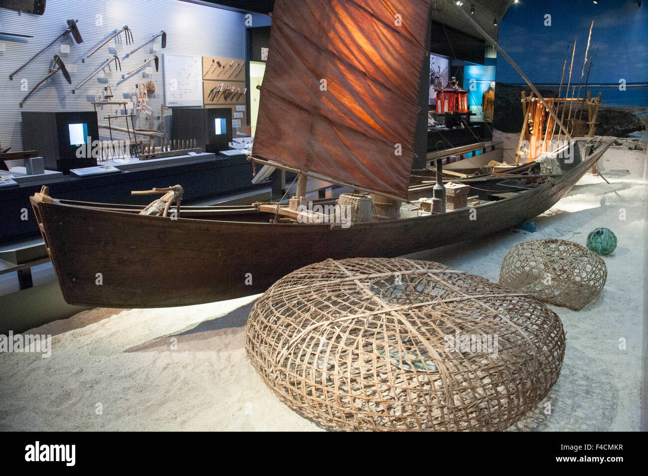 Display of full-size classic Okinawan 'Sabani' sail boat used by ...