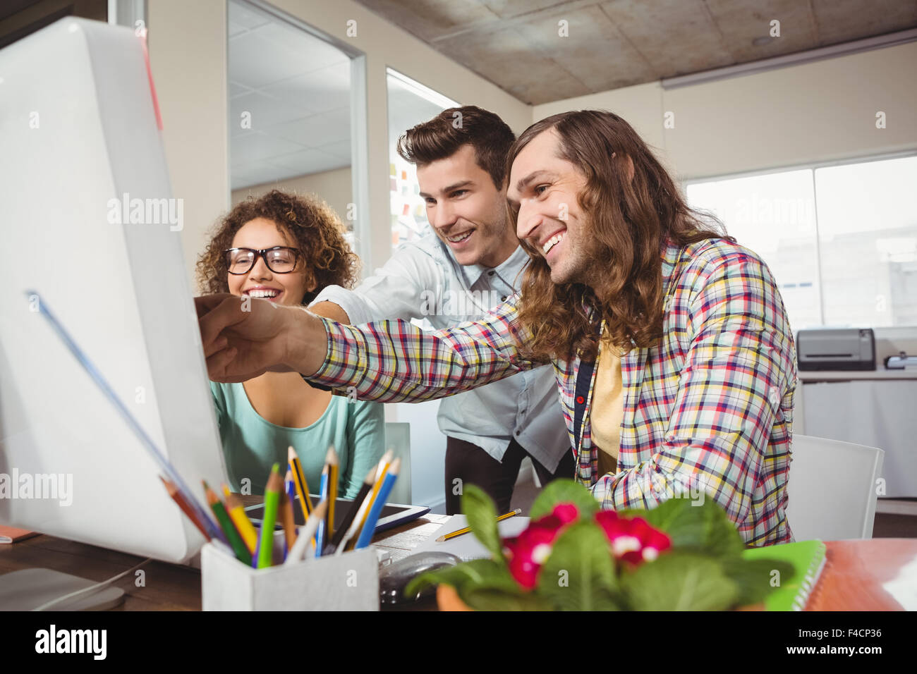 Pointing business casual colleagues hi-res stock photography and images ...