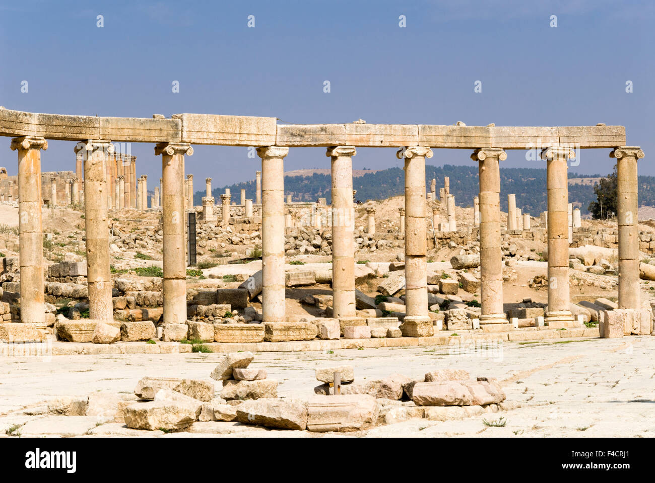 Oval Plaza with colonnade and ionic columns, Jerash, Jordan. Once the ...