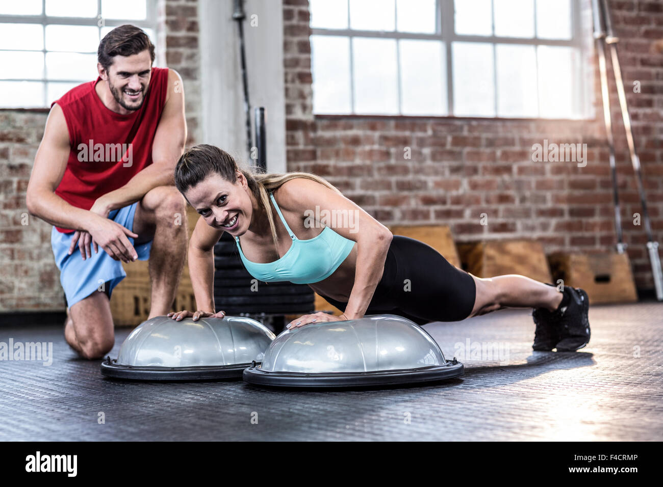 Female trainer guiding male hi-res stock photography and images - Alamy