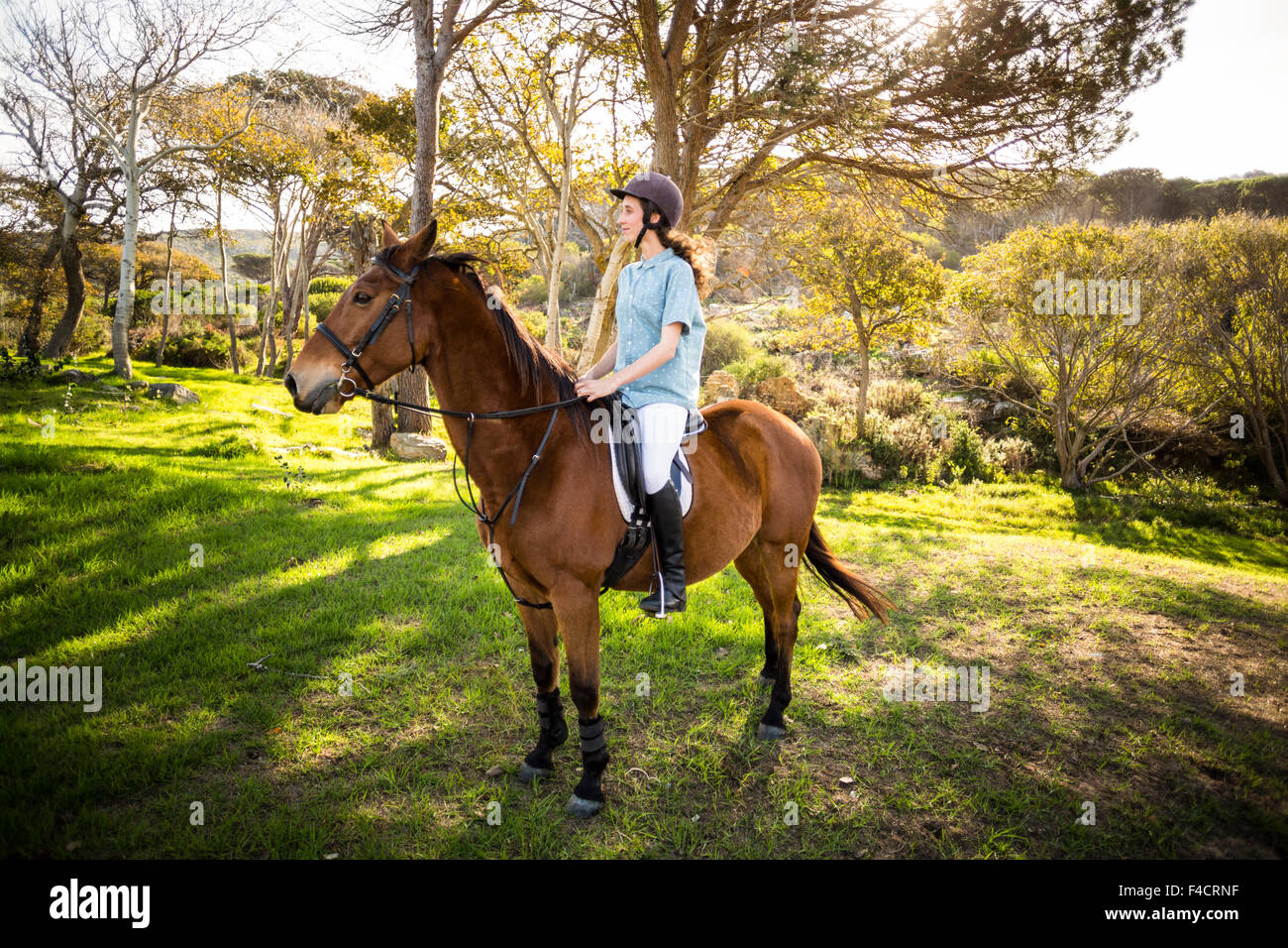 Woman riding horse hi-res stock photography and images - Alamy