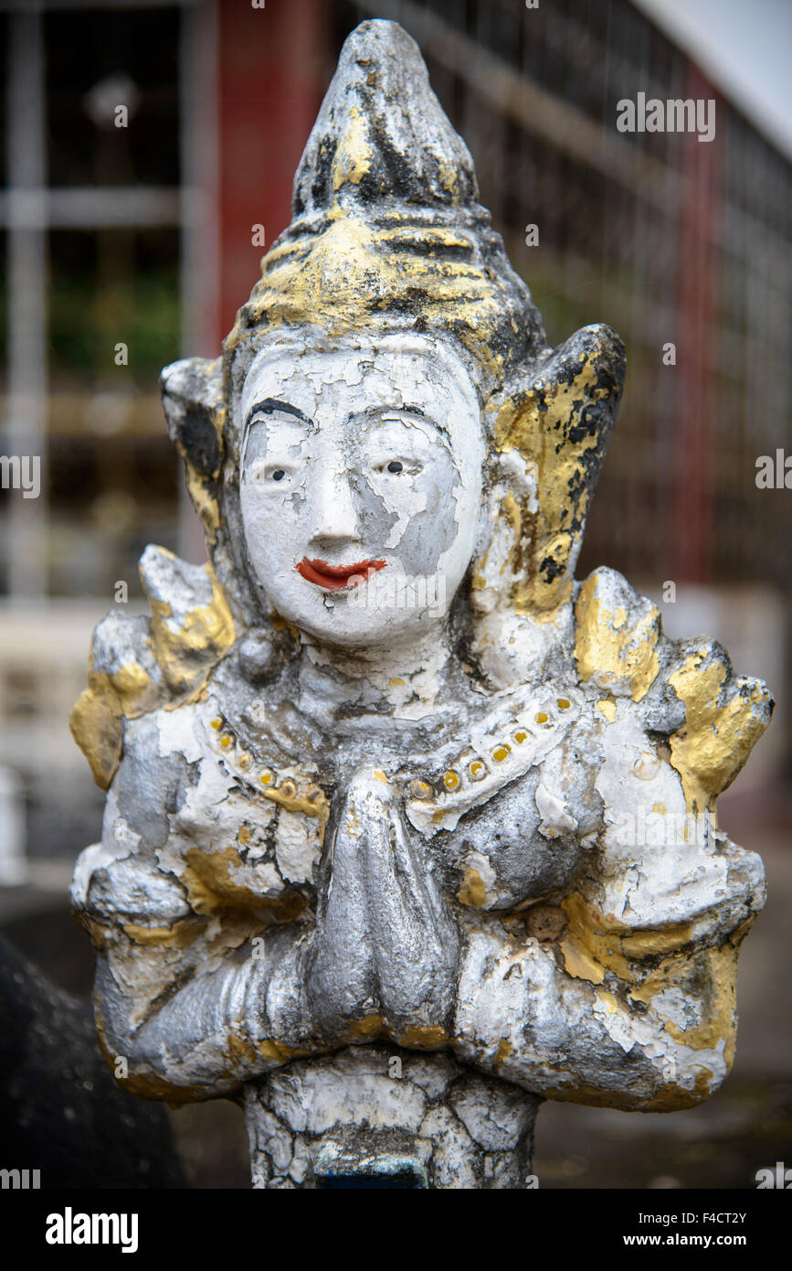 Laos, Luang Prabang. Statue at Buddhist temple. (Large format sizes ...