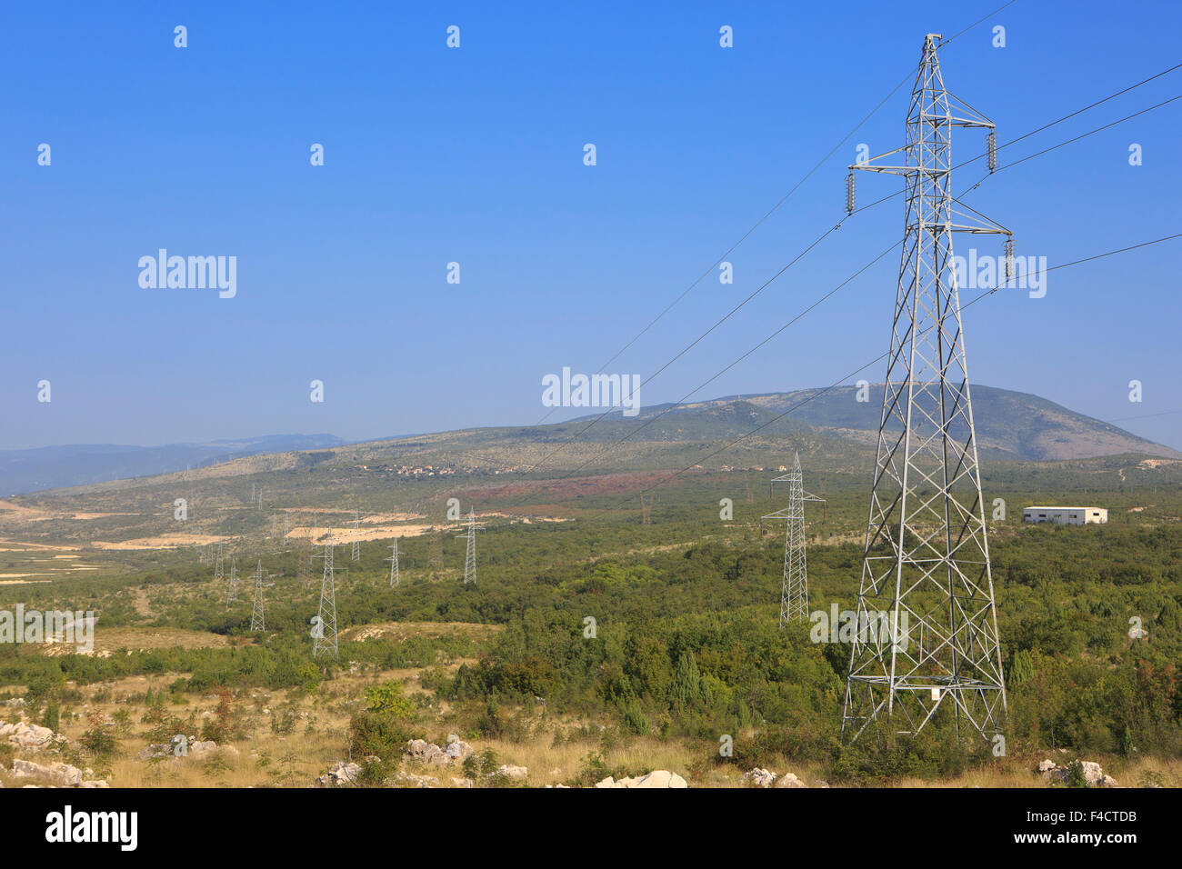 Electrical towers carrying power lines across Bosnia-Herzegovina Stock ...