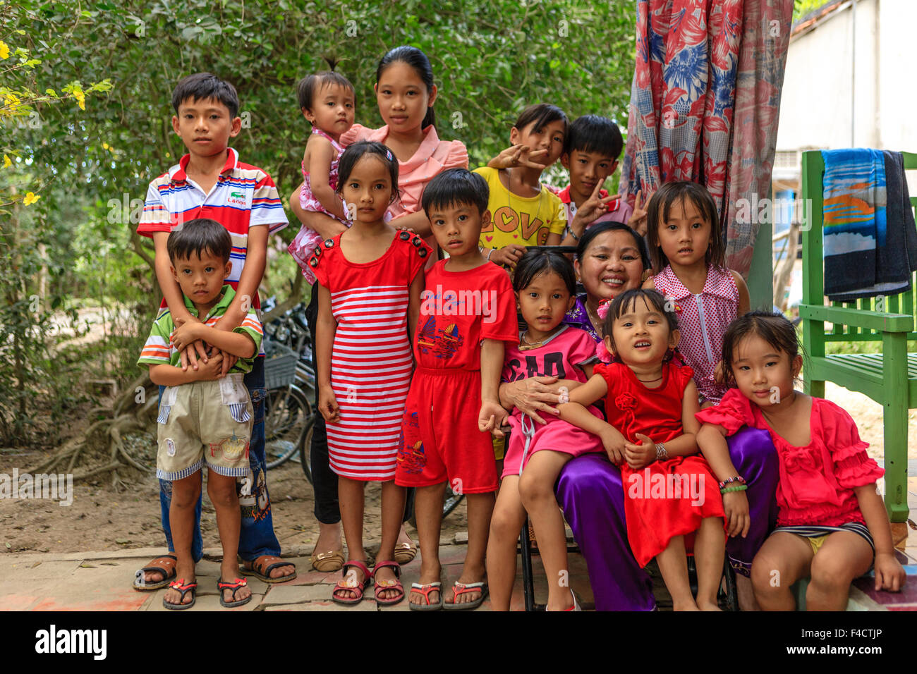 All family. Children posing. Sa Dec. Vietnam, Indochina, South East ...