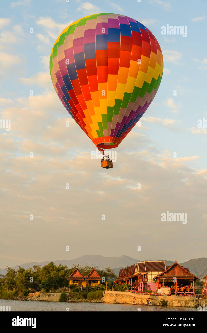 Laos, Vang Vieng. Hot air balloon over city. (Large format sizes ...