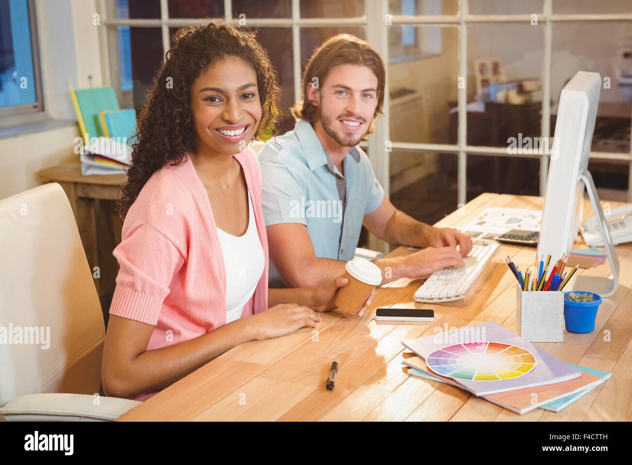 Portrait of business people working on computer Stock Photo - Alamy