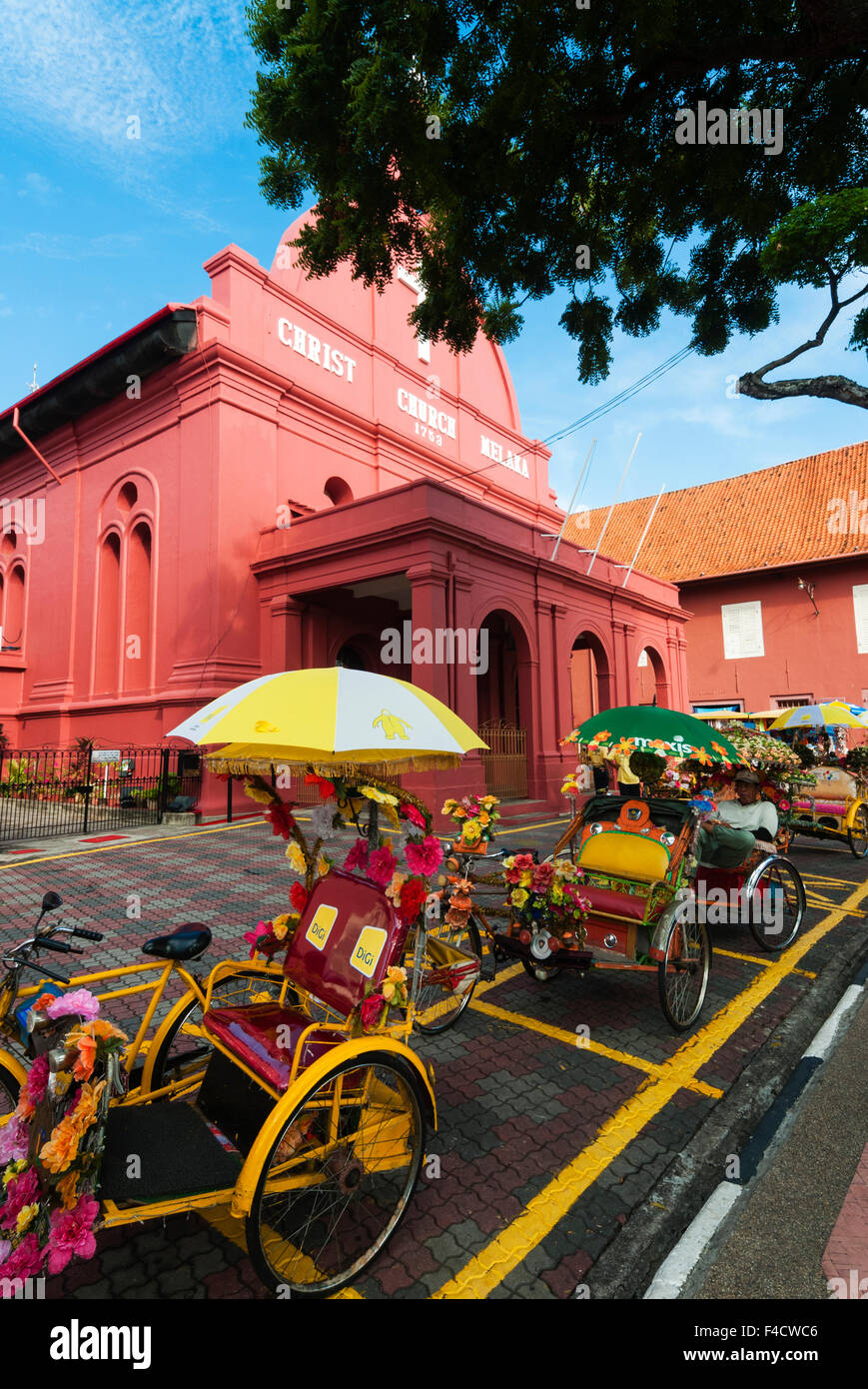 Rickshaw and Christ Church in town square, a UNESCO World heritage site ...