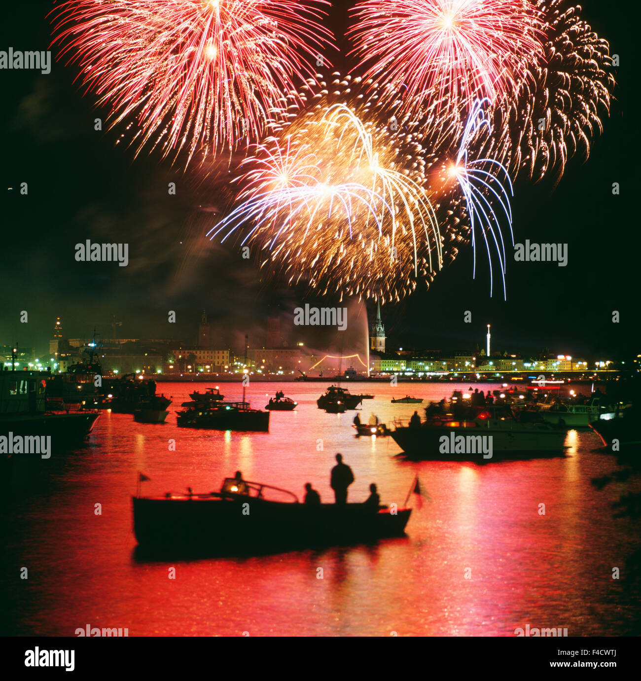 Fire cracker above sea Stock Photo - Alamy