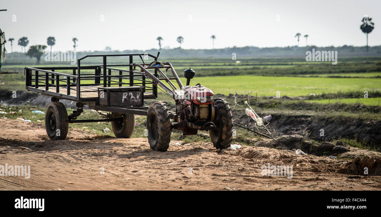 Cambodia, Siem Reap. Tractor and rice fields Stock Photo - Alamy