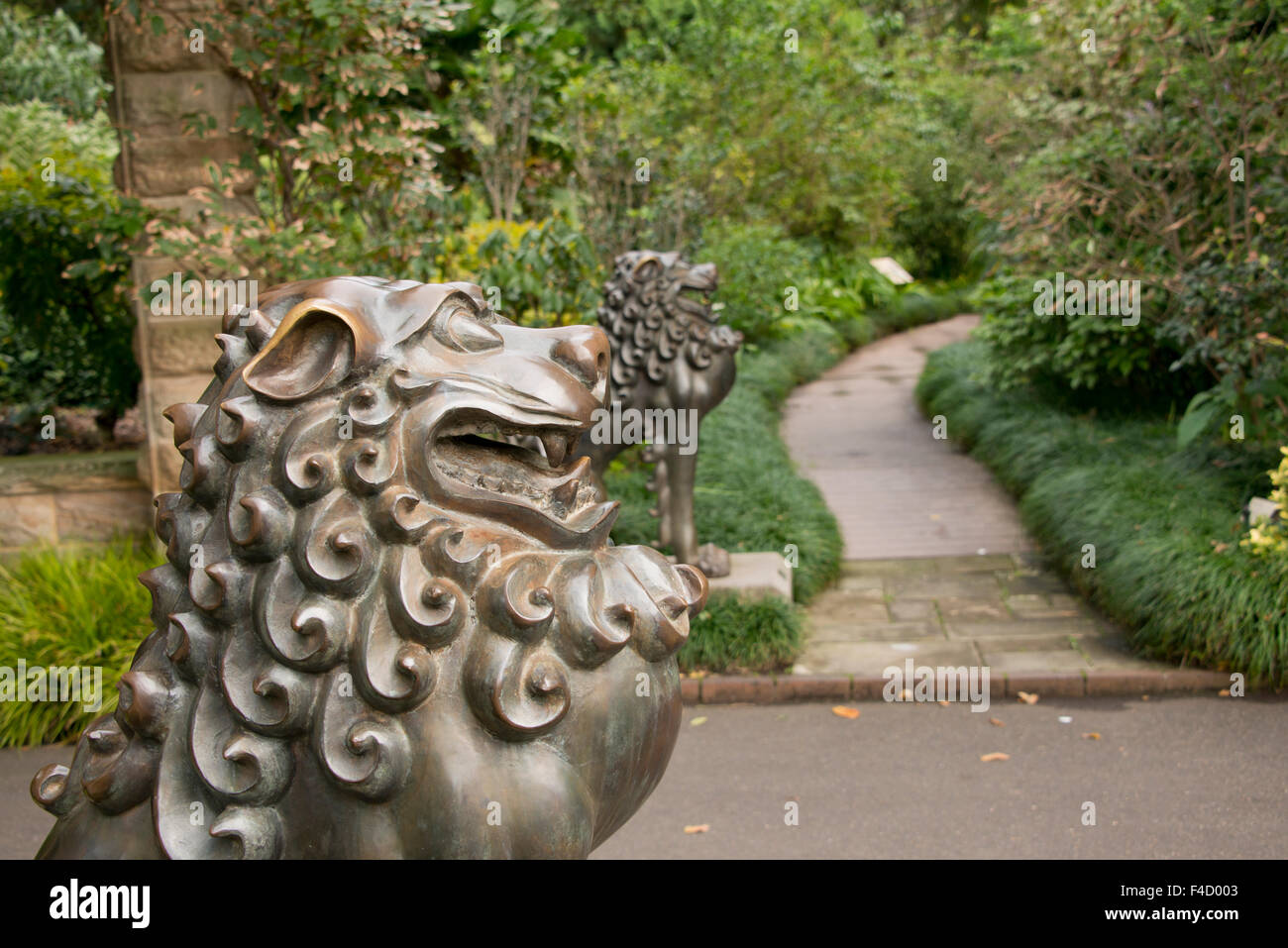 Australia, Sydney, Royal Botanic Gardens. Mythological lion statue in ...