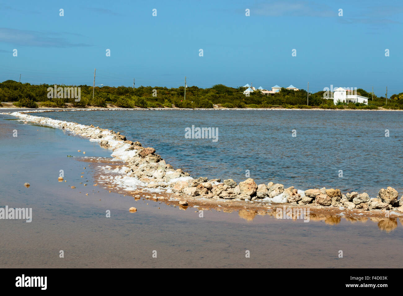 Caribbean, Anguilla. View of salt evaporation pond. Salt is one of ...