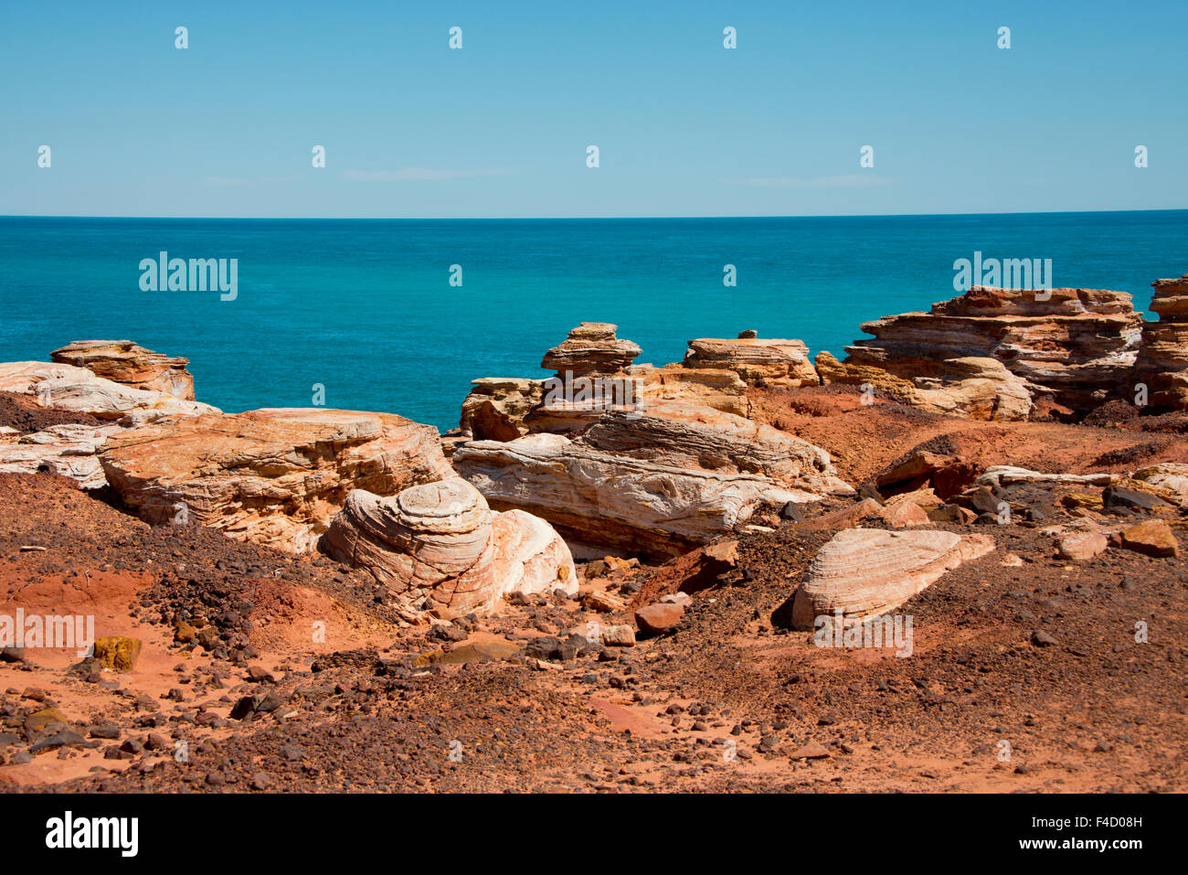Australia, Broome. Gantheaume Point. Indian Ocean view of the rocky red ...
