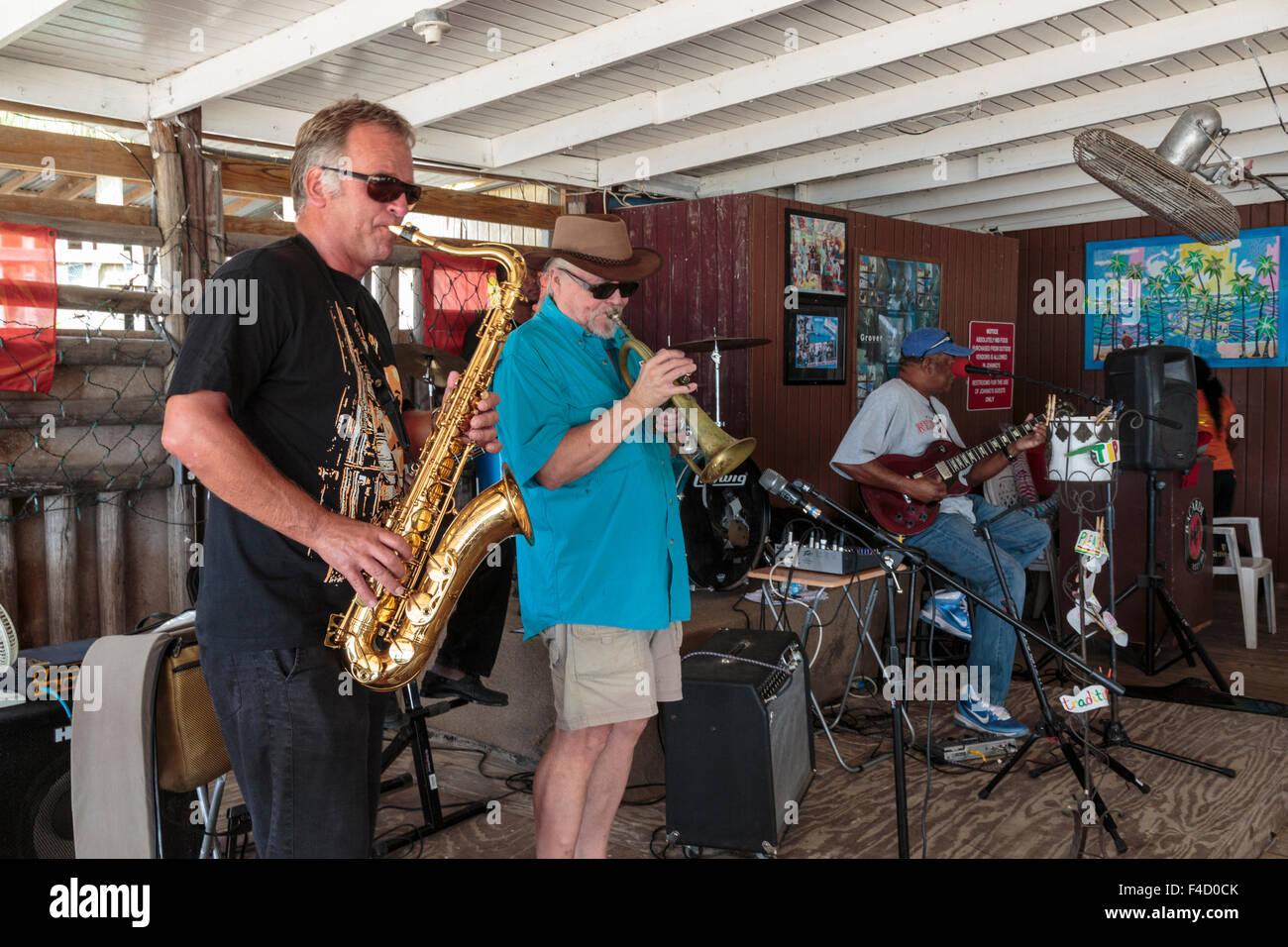 Caribbean, Anguilla. Men playing in band at beachside restaurant Stock ...