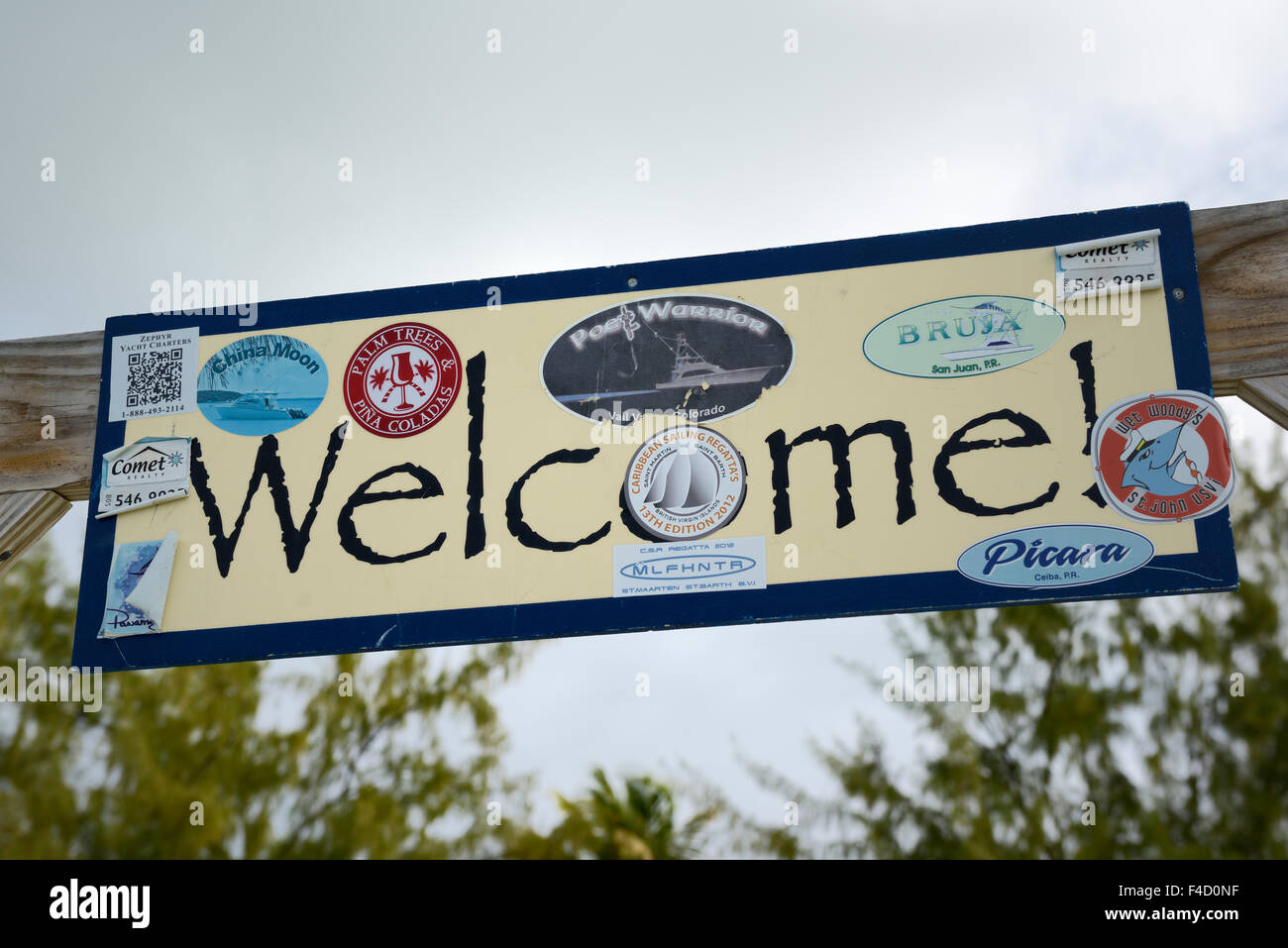 Caribbean, British Virgin Islands, Anegada. Welcome sign on the dock at ...