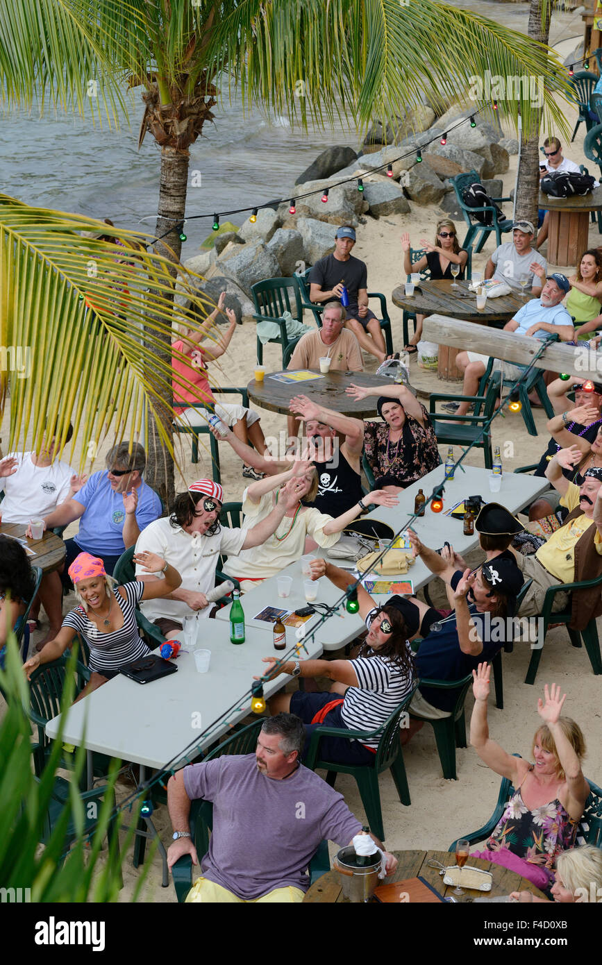 Caribbean, British Virgin Islands, Virgin Gorda. Crowd at the Michael ...