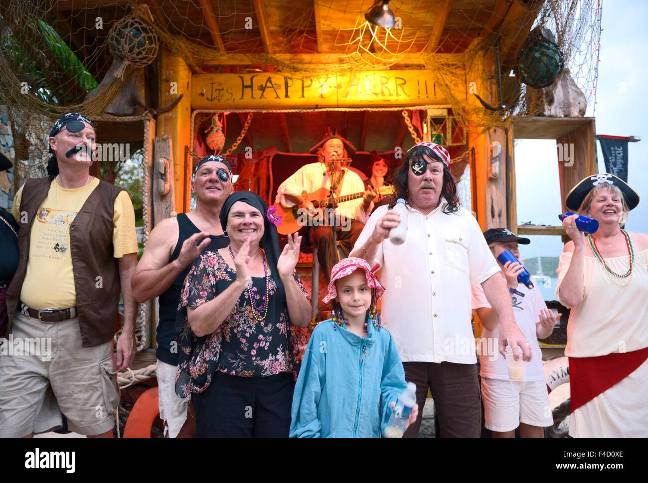 Caribbean, British Virgin Islands, Virgin Gorda. A crowd of pirates at ...