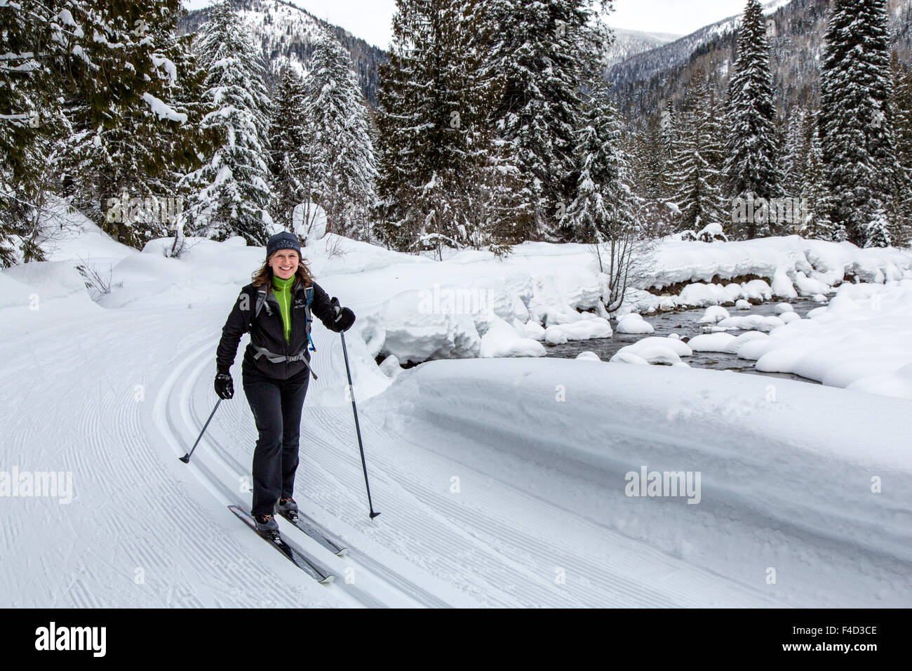 Cross country skiing along the Salmo River near Nelson, British ...