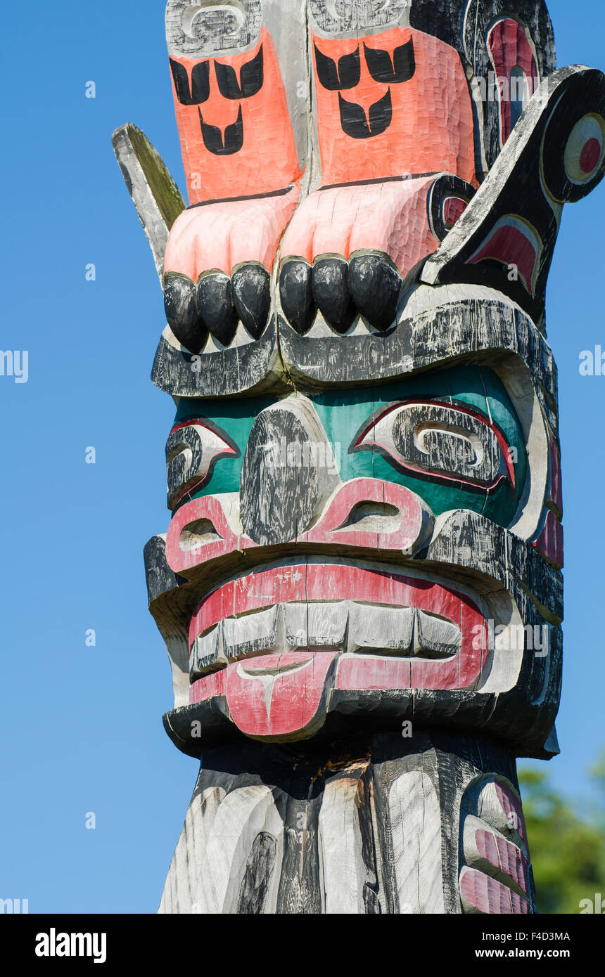 Totem poles in cemetery in Alert Bay, British Columbia, Canada Stock ...