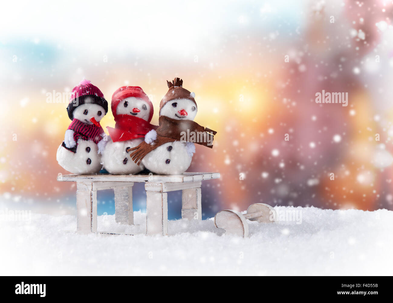 Snowman on sledge hi-res stock photography and images - Alamy