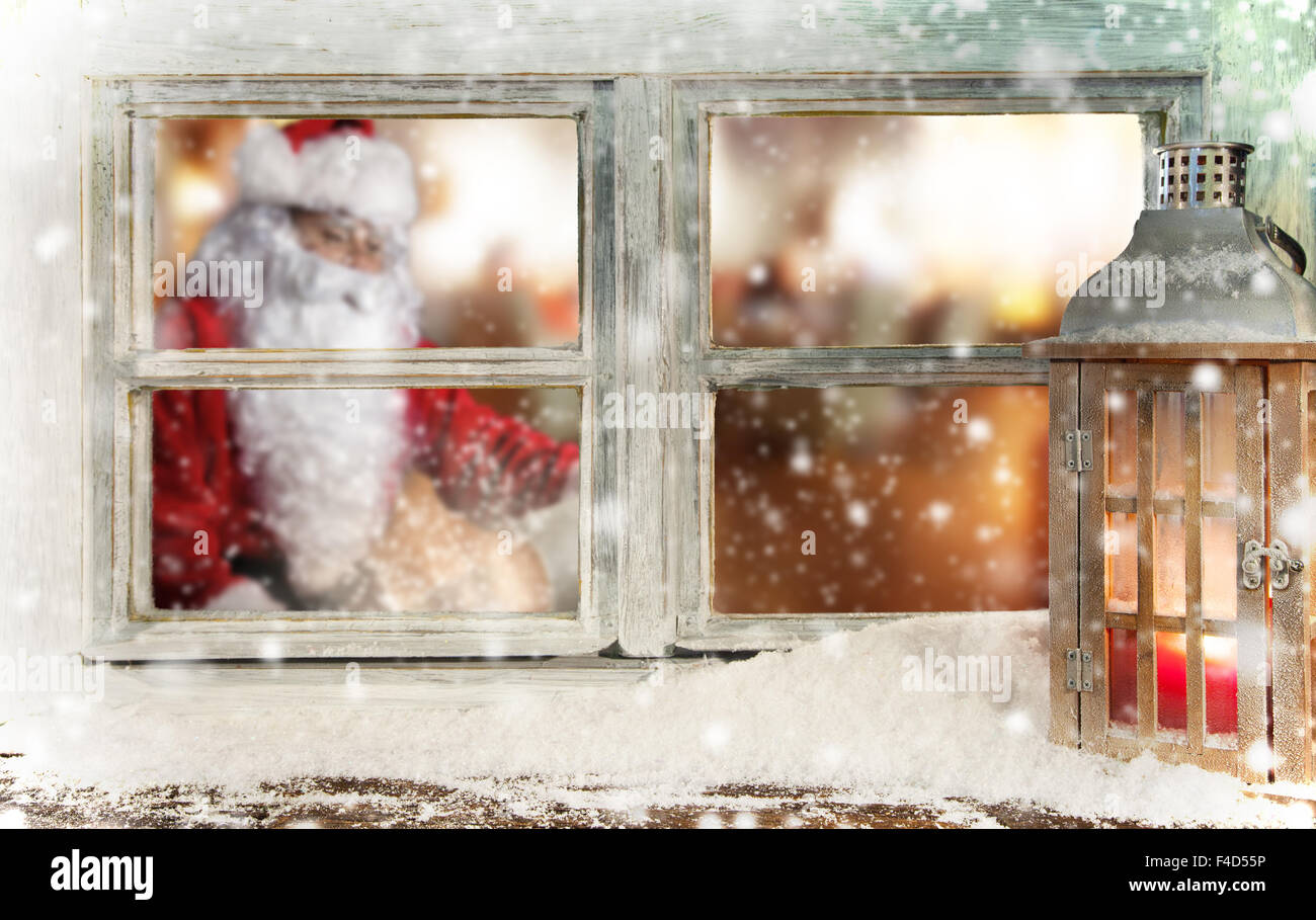 Atmospheric Christmas window with Santa Claus Stock Photo - Alamy