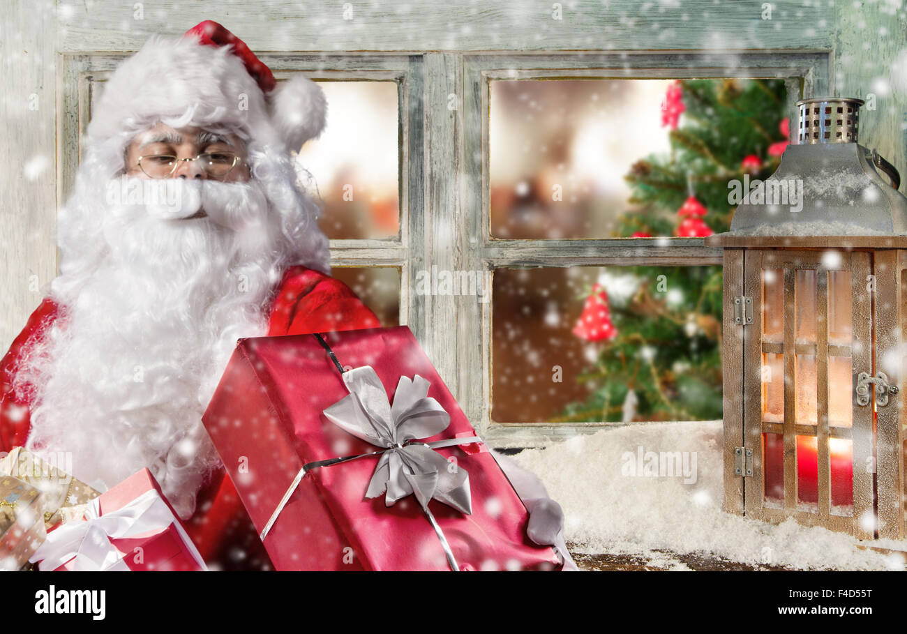 Atmospheric Christmas window with Santa Claus Stock Photo - Alamy