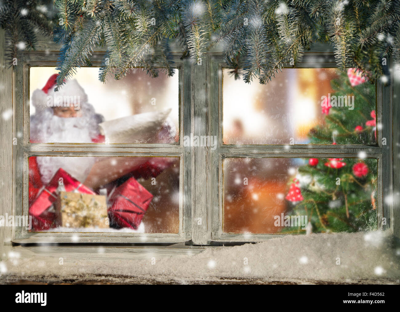 Santa looking in window hi-res stock photography and images - Alamy