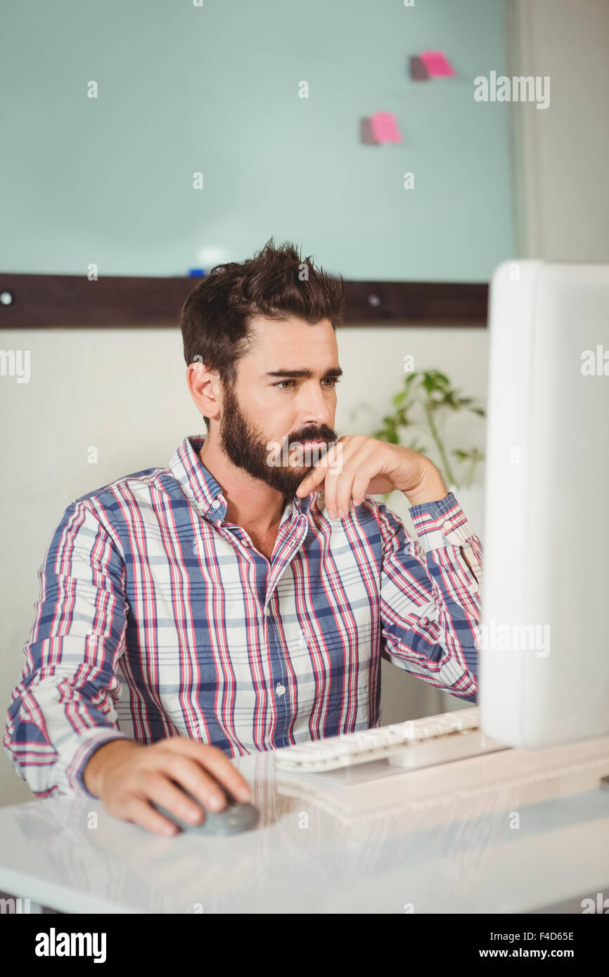 Man working on computer Stock Photo - Alamy