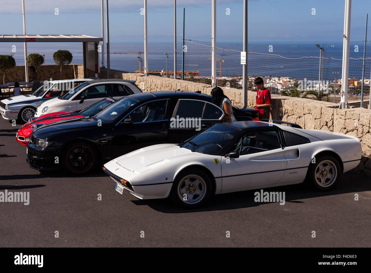 White Ferrari in car park Stock Photo - Alamy