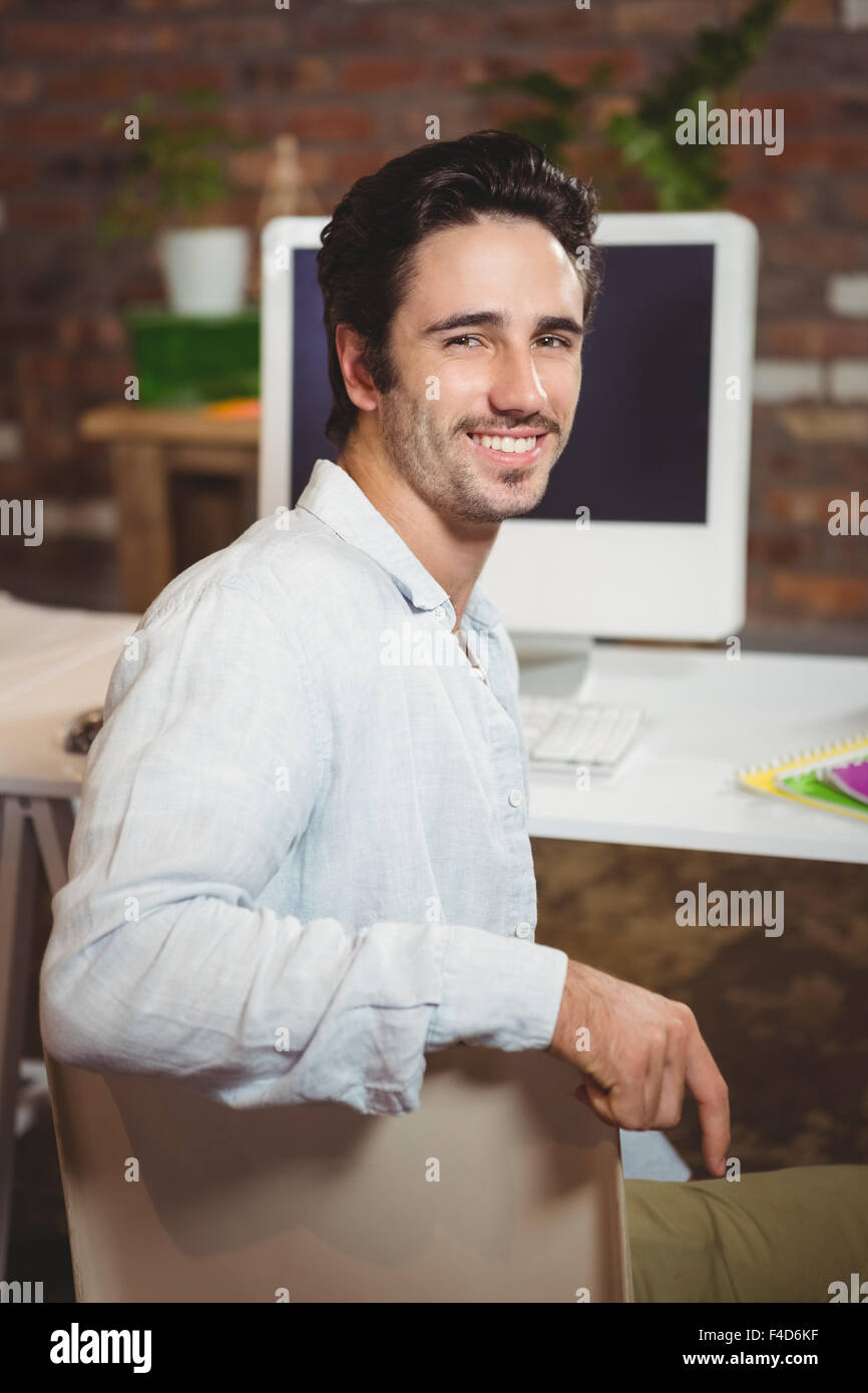 Professional man sitting desk hi-res stock photography and images - Alamy