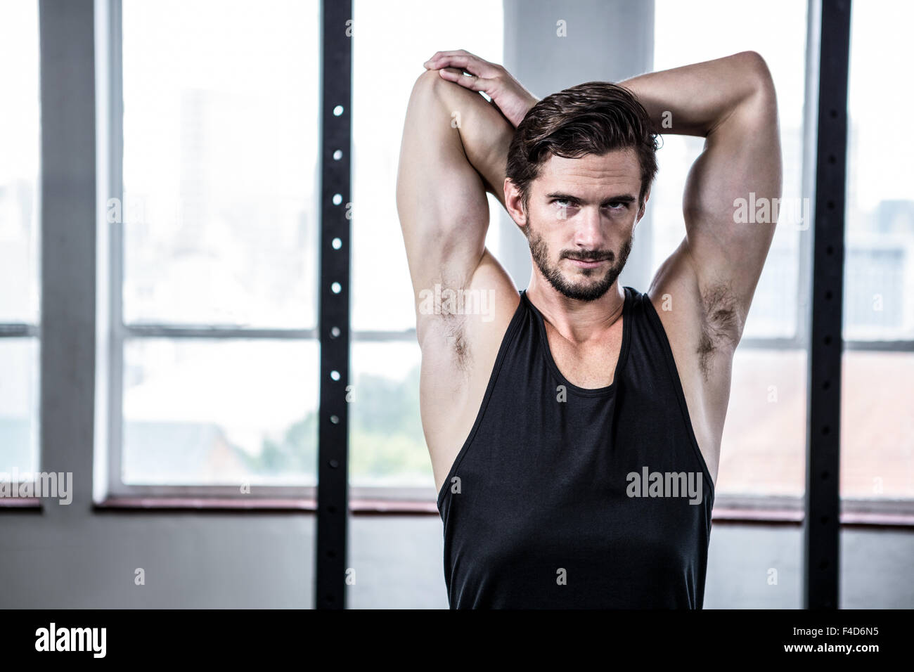 Fit man stretching his arms Stock Photo - Alamy