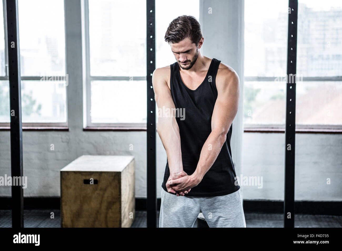 Strong fit man warming up hi-res stock photography and images - Alamy
