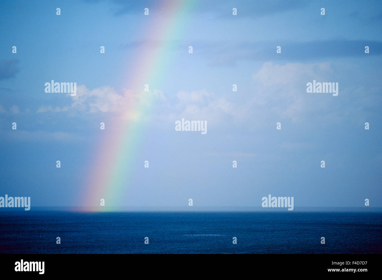 Single rainbow over sea Stock Photo - Alamy