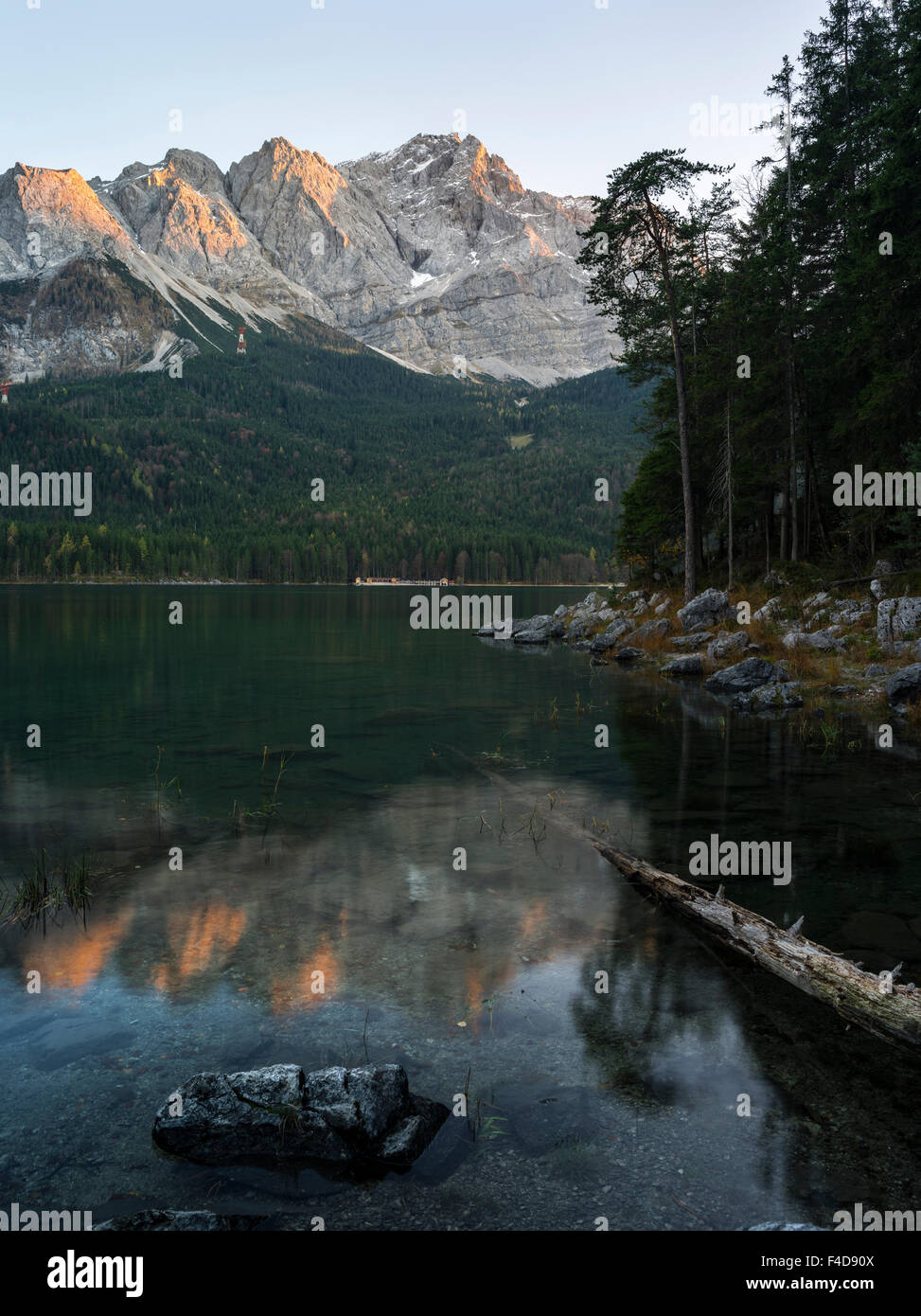 Lake Eibsee in early winter, fall with mount Zugspitze in the ...
