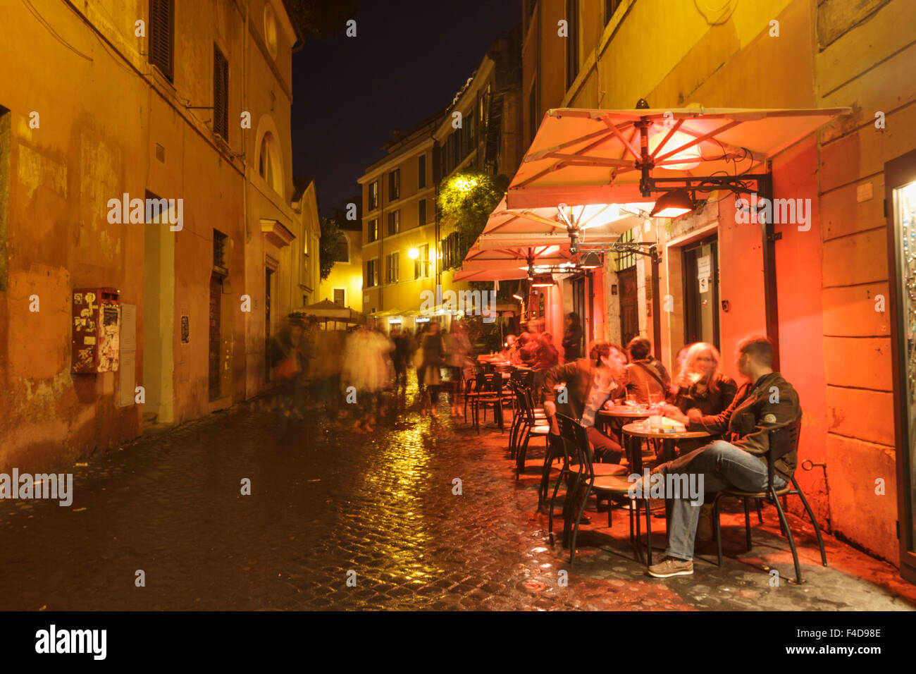 Outdoor bar terrace at night in Trastevere, Rome, Italy Stock Photo - Alamy