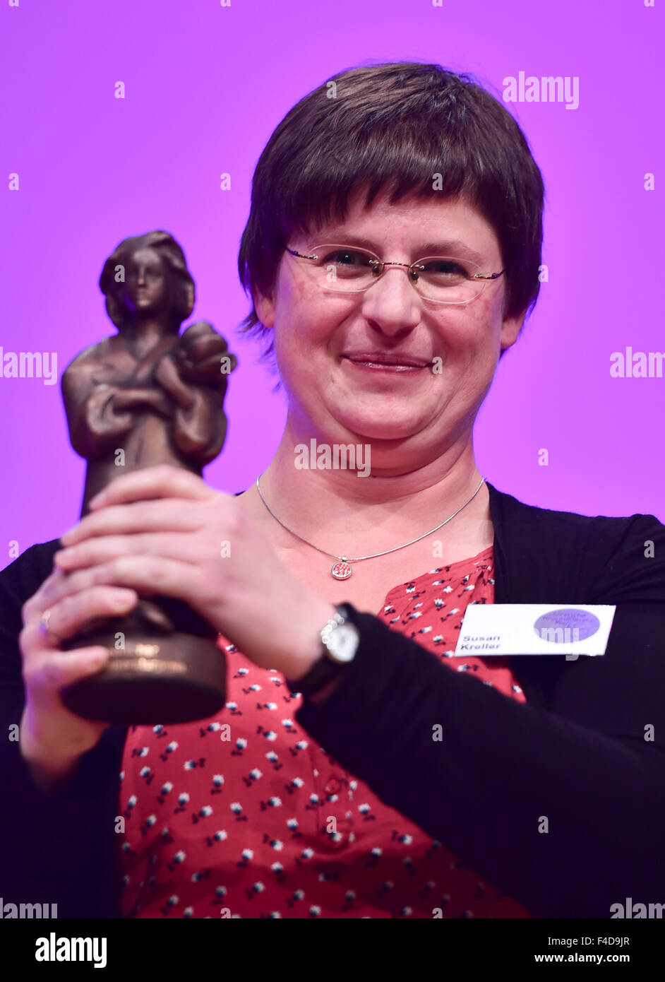 Frankfurt, Germany. 16th Oct, 2015. Author Susan Kreller holds up her ...