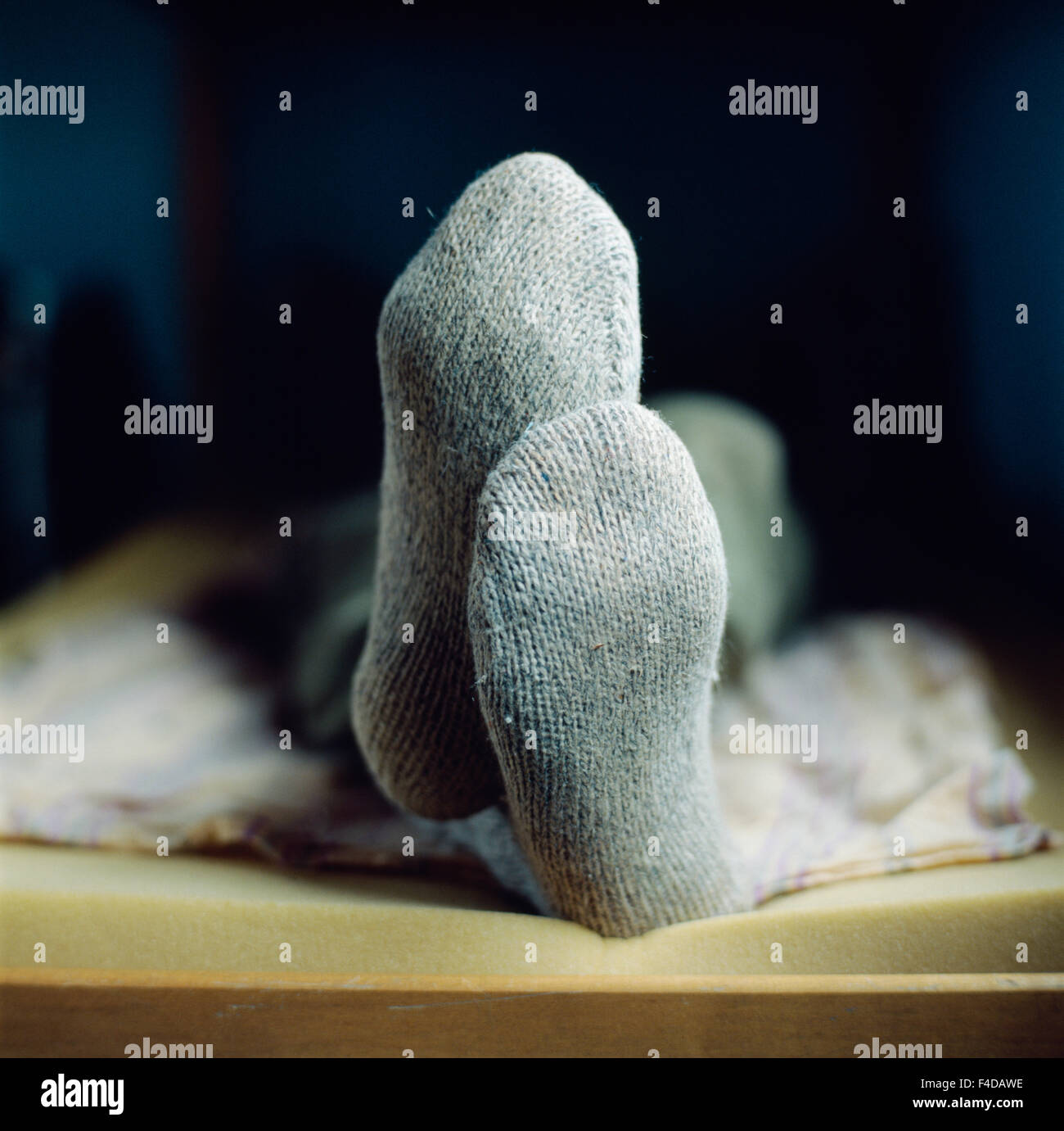 Person wearing socks, close-up Stock Photo - Alamy